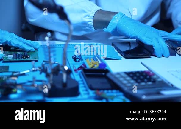 the scientist is checking the sample in the computer laboratory Stock ...