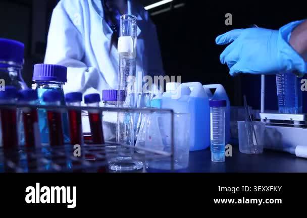 scientist in lab with chemical tubes in laboratory Stock Video Footage ...