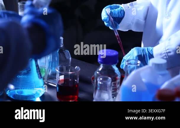 scientist holding test tube in laboratory Stock Video Footage - Alamy