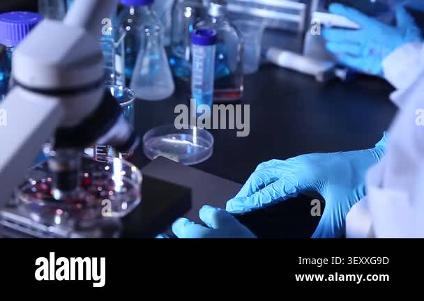 close up scientist hands holding glass of water in laboratory Stock ...