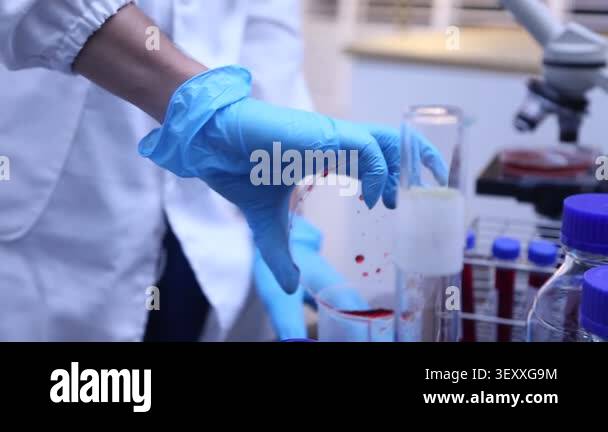 scientist with a test tube in the lab Stock Video Footage - Alamy