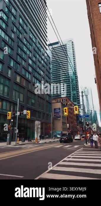 typical downtown toronto street with modern skyscrapers and urban ...