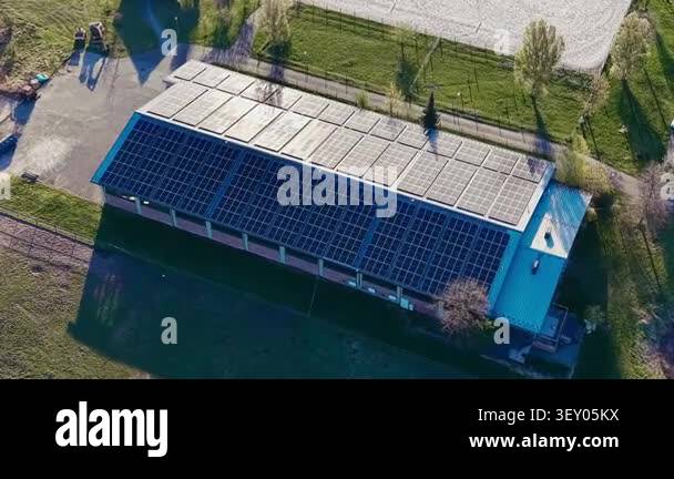 Solar power system on commercial building roof Stock Video Footage - Alamy