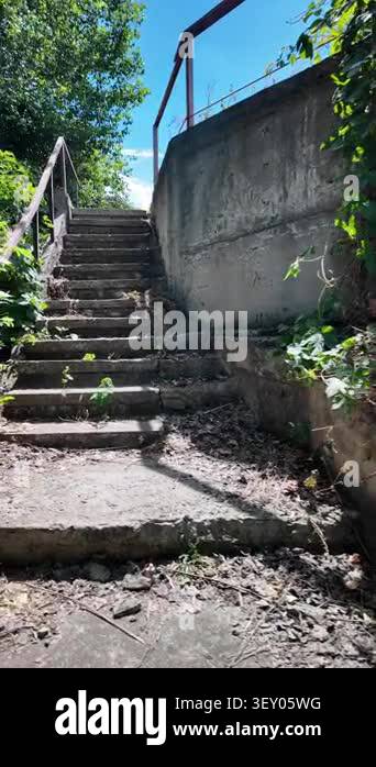Cinematic 4K 24fps footage with natural motion blur. Abandoned concrete ...