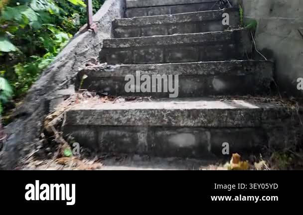 Cinematic 4K 24fps footage with natural motion blur. Abandoned concrete ...