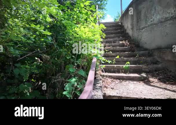 Cinematic 4K 24fps footage with natural motion blur. Abandoned concrete ...
