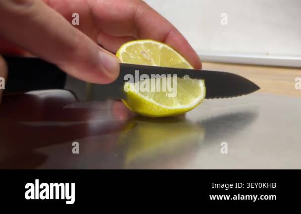 Man cut fresh half yellow organic citrus lemon fruit texture into ...