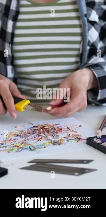 Close-Up Vertical Video Of A Woman Sharpening Colored Pencils Stock ...