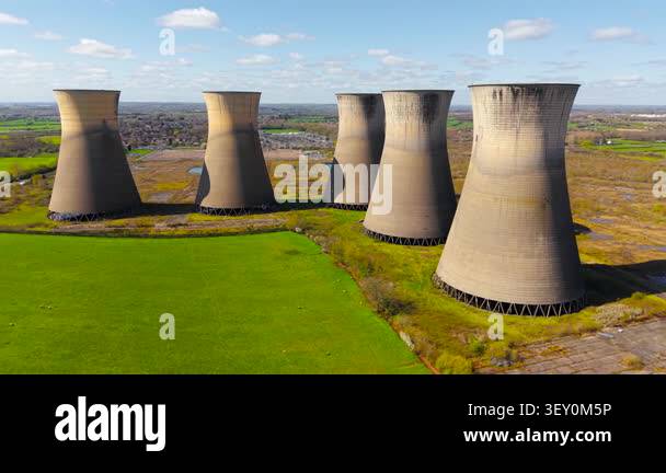 Aerial perspective of derelict nuclear plant with multiple cooling ...