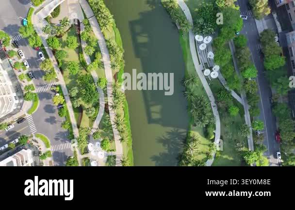 Top-down aerial view of Sala Urban Park Saigon with it's famous bridge ...