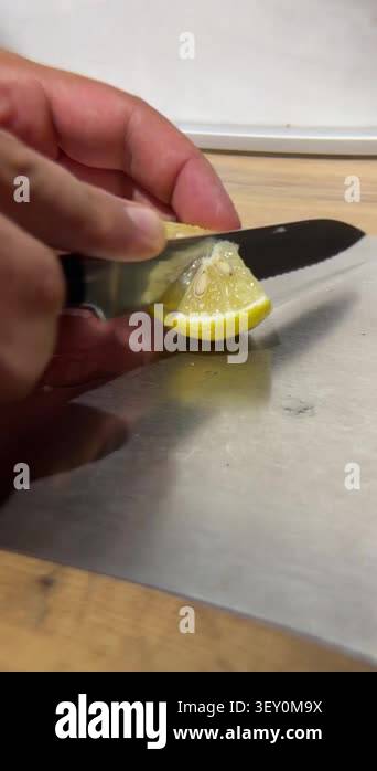 Man cut fresh half yellow organic citrus lemon fruit texture into ...