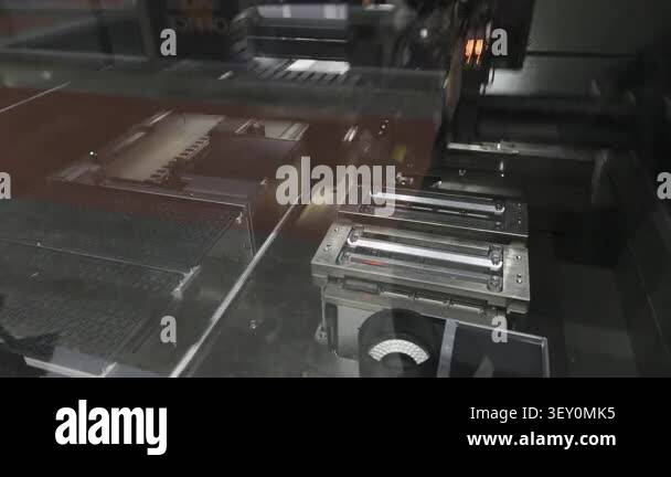 PCB assembly machine in Electronics manufacturing SMT production line ...