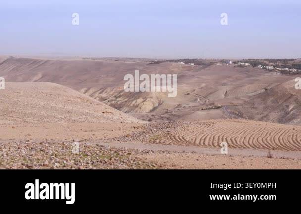 A wide view of the historic Shobak Castle ruins overlooking a vast ...