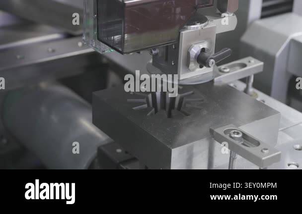 EDM Wire cutting machine working, Closeup Wire Electrical Discharge ...