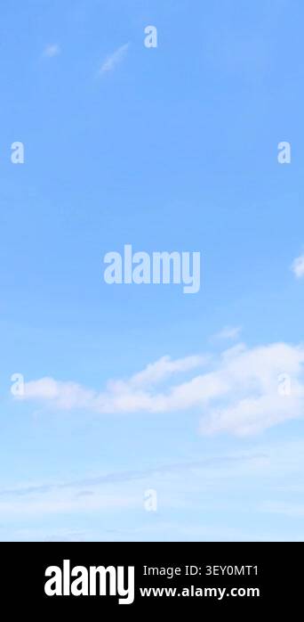 Beautiful blue sky with fluffy white clouds, natural background with ...