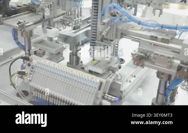 Pneumatic robotic arm in industrial automation system. Automated ...