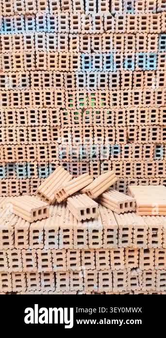 Background of stacked red clay bricks in construction site Stock Video ...