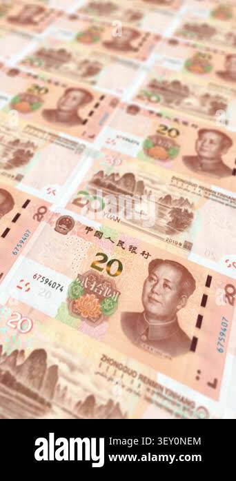 Seamless looping animation of stacked Chinese 20 yuan banknotes ...
