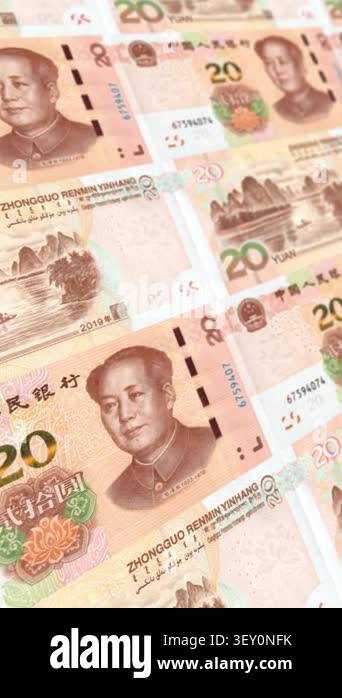 Seamless looping animation of stacked Chinese 20 yuan banknotes ...