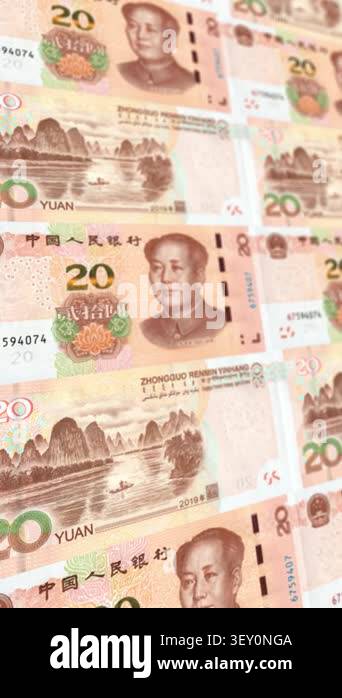 Seamless looping animation of stacked Chinese 20 yuan banknotes ...