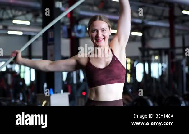 Healthy Athletic Woman with Toned Body Working Out in Professional Gym ...