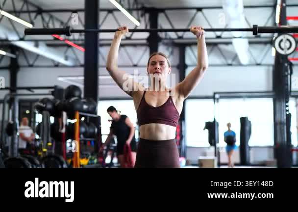 Healthy Athletic Woman with Toned Body Working Out in Professional Gym ...