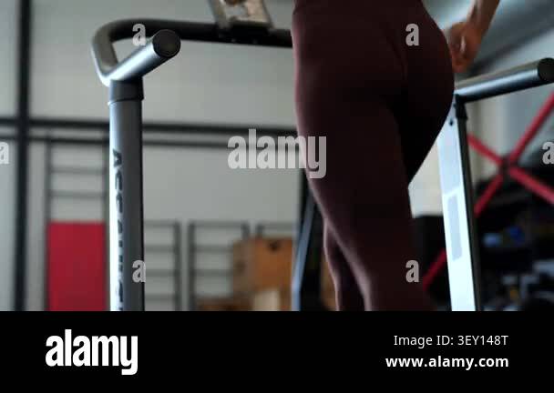 Healthy Athletic Woman with Toned Body Working Out in Professional Gym ...