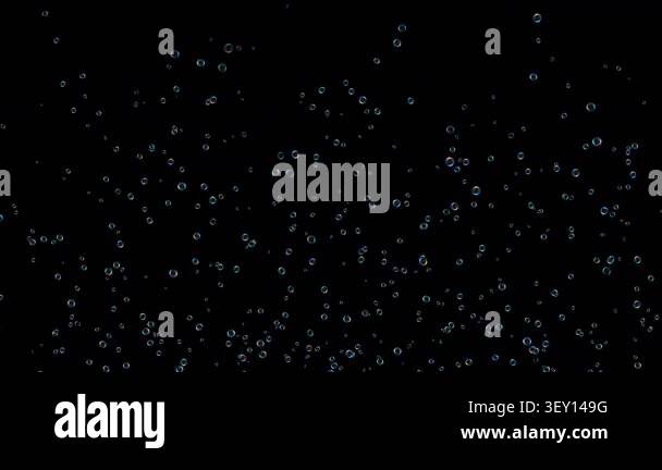 Transparent soap bubbles gently float across a dark background with ...