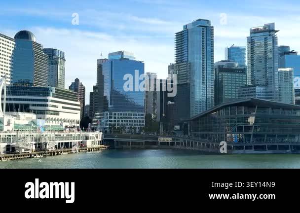 View of Vancouver, Canada with tall buildings along the waterfront. The ...