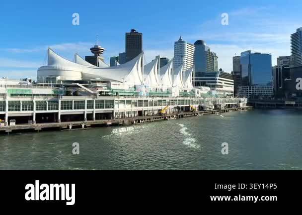 View of Vancouver, Canada with tall buildings along the waterfront. The ...