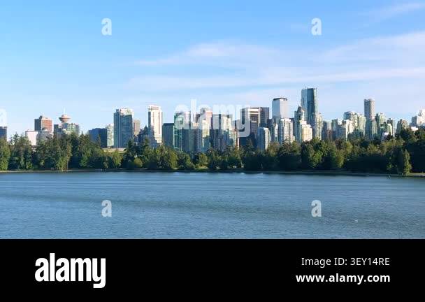 View of Vancouver, Canada with tall buildings along the waterfront. The ...