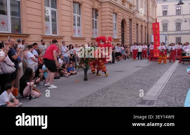 Sibiu, Romania - 26 June 2026 A vibrant Chinese lion dance performance ...