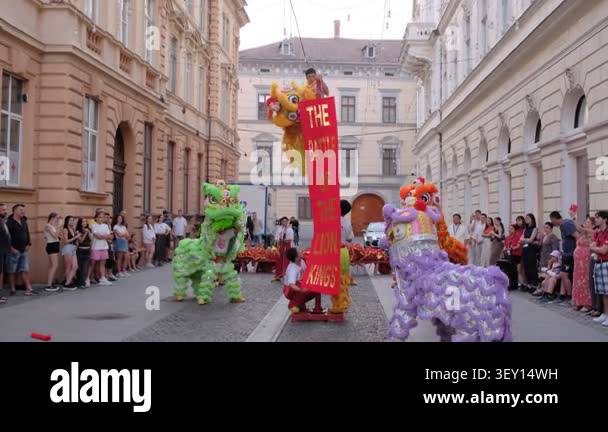 Sibiu, Romania - 26 June 2026 A vibrant Chinese lion dance performance ...