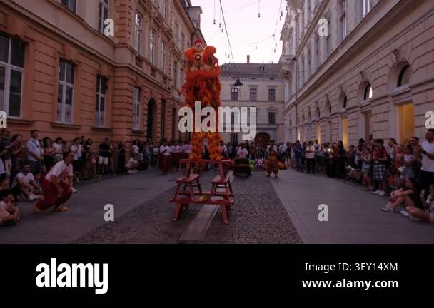 Sibiu, Romania - 26 June 2026 A vibrant Chinese lion dance performance ...
