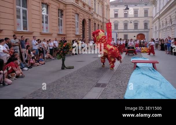 Sibiu, Romania - 26 June 2026 A vibrant Chinese lion dance performance ...