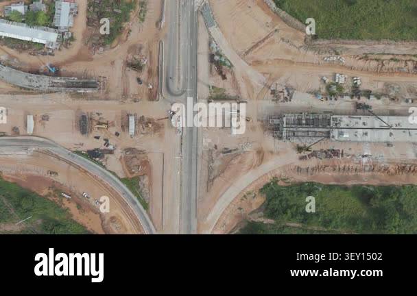 Aerial view drone footage of construction site building cross ...