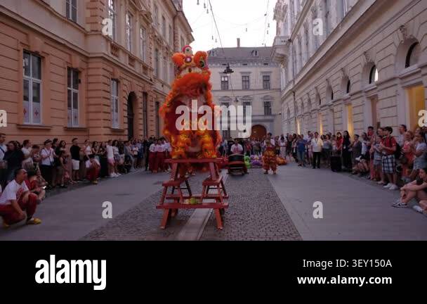 Sibiu, Romania - 26 June 2026 A vibrant Chinese lion dance performance ...