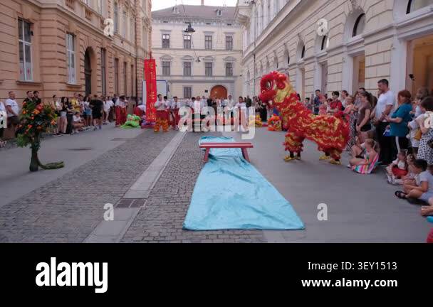 Sibiu, Romania - 26 June 2026 A vibrant Chinese lion dance performance ...