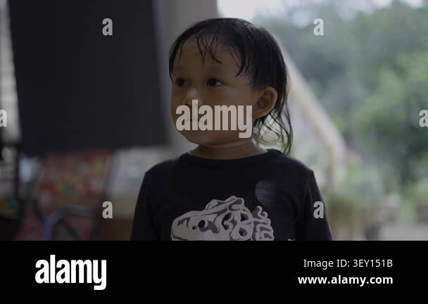 asian little boy in the park Stock Video Footage - Alamy