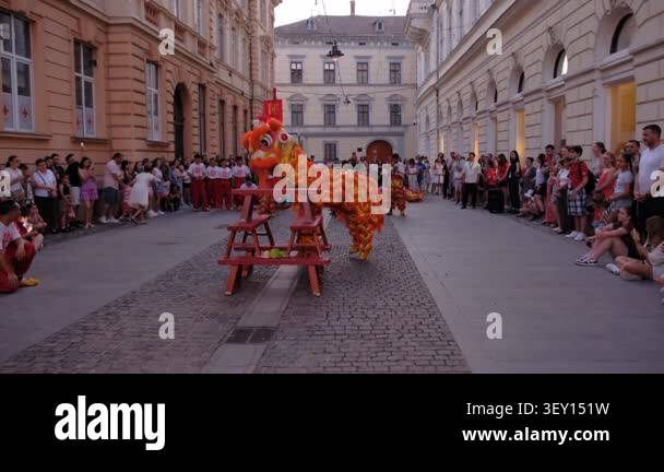 Sibiu, Romania - 26 June 2026 A vibrant Chinese lion dance performance ...