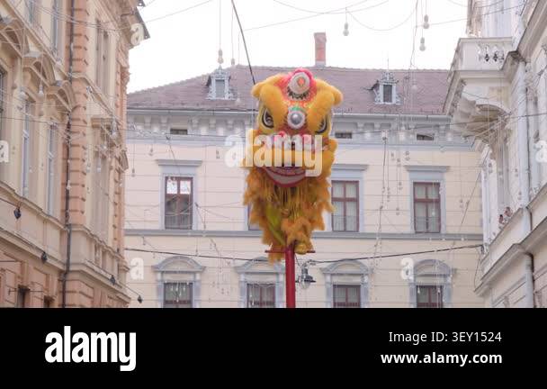 Sibiu, Romania - 26 June 2026 A vibrant Chinese lion dance performance ...