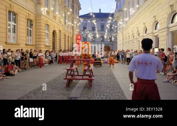 Sibiu, Romania - 26 June 2026 A vibrant Chinese lion dance performance ...