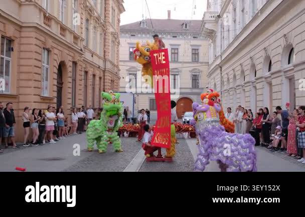 Sibiu, Romania - 24 June 2026 A vibrant Chinese lion dance performance ...