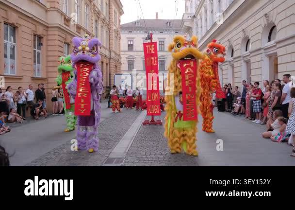 Sibiu, Romania - 26 June 2026 A vibrant Chinese lion dance performance ...