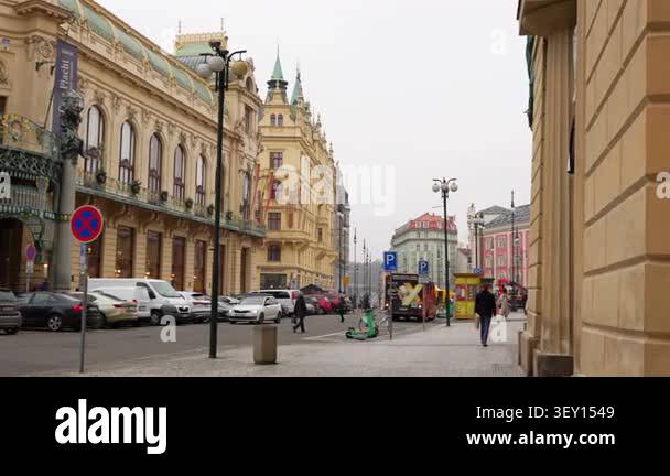 The Municipal House facade showcases a decorative mosaic and domed roof ...