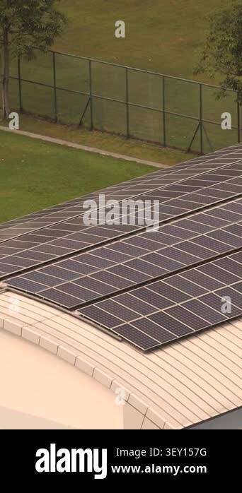 Solar panels installed on warehouse roof for renewable energy ...
