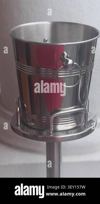 Two elegant ice buckets for champagne in a stylish restaurant, adding a ...