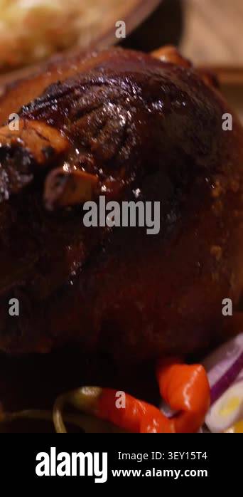 Traditional Czech dishes with roasted pork knuckle and potato casserole ...