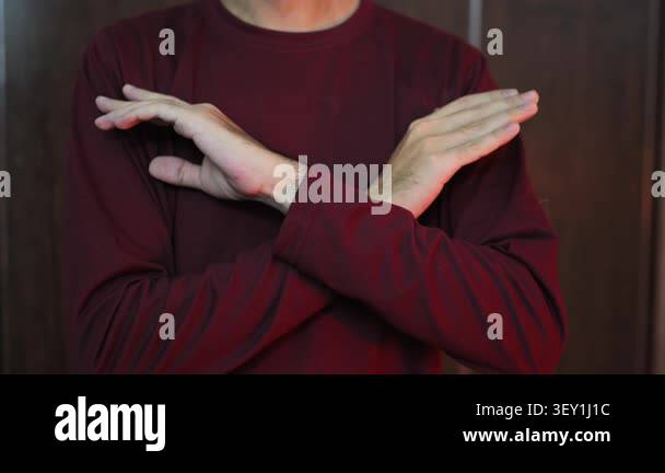 STOP hand gesture The guy shows a denial gesture with his hands. No ...