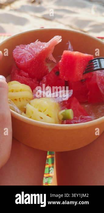 Vertical video. First Person View Of Hands Holding Bowl Of Fresh ...
